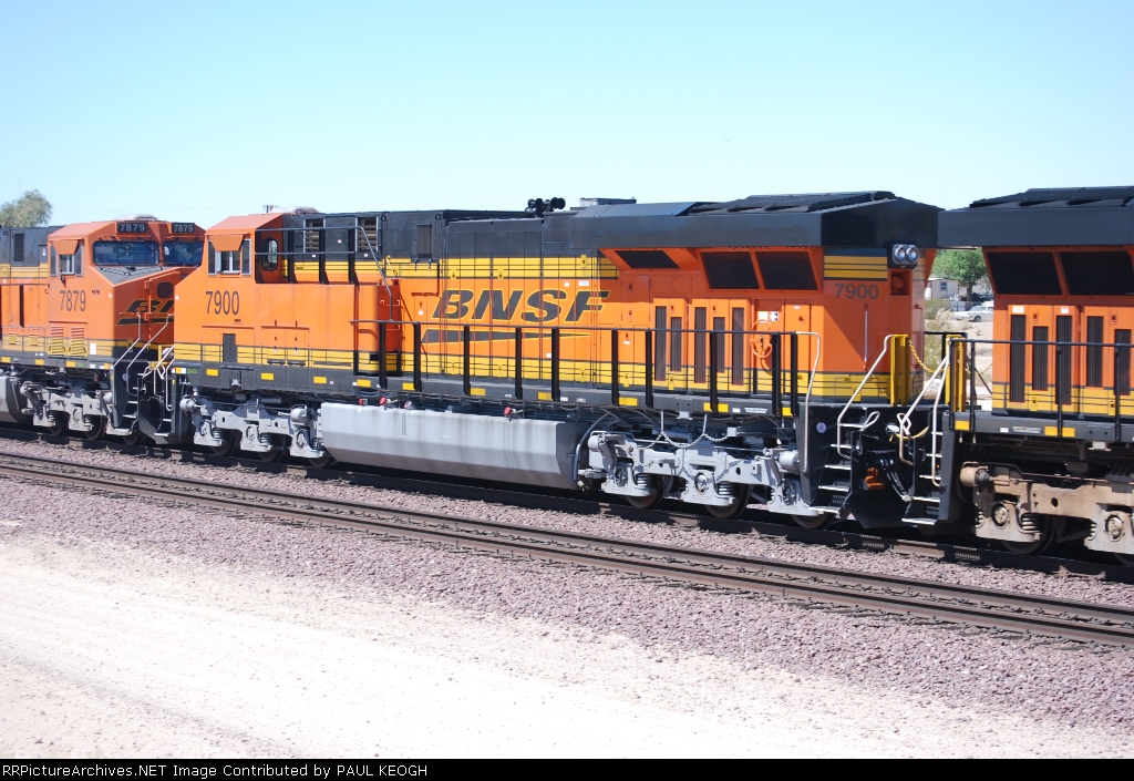 BNSF 7900 passes me by as she rolls west with BNSF 7879 ahead of her.